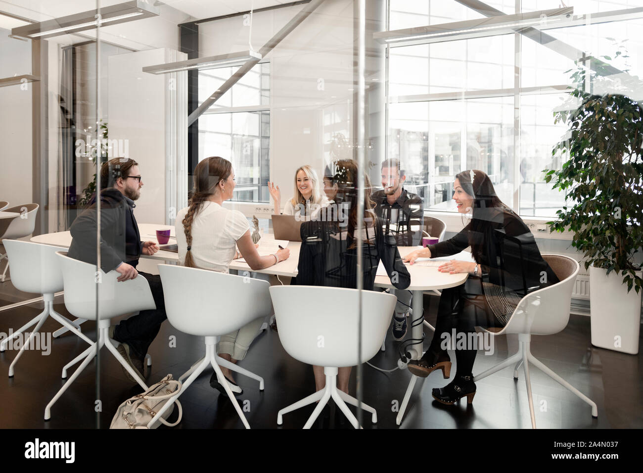 Coworkers at business meeting Stock Photo - Alamy