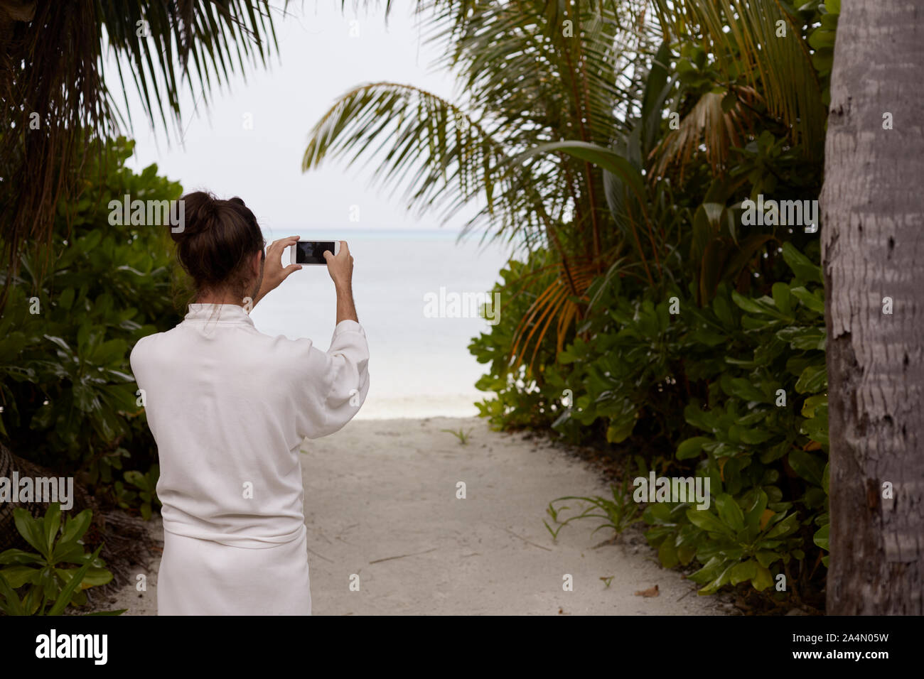 Dressing gown man rear hi-res stock photography and images - Alamy