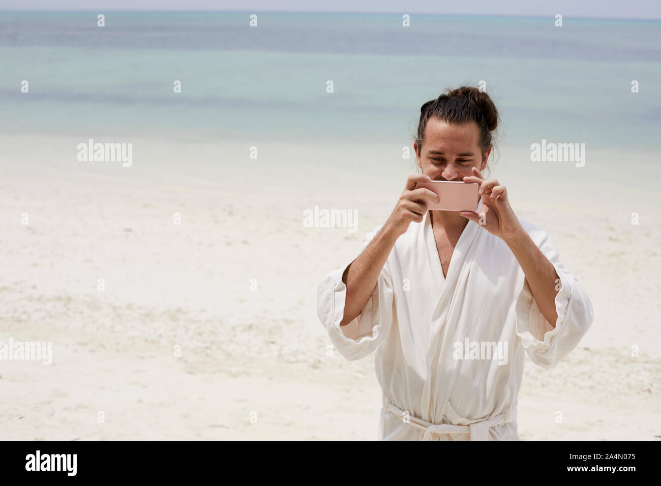 Man wearing dressing gown on beach Stock Photo - Alamy Man wearing dressing gown on beach Stock Photo - Alamy