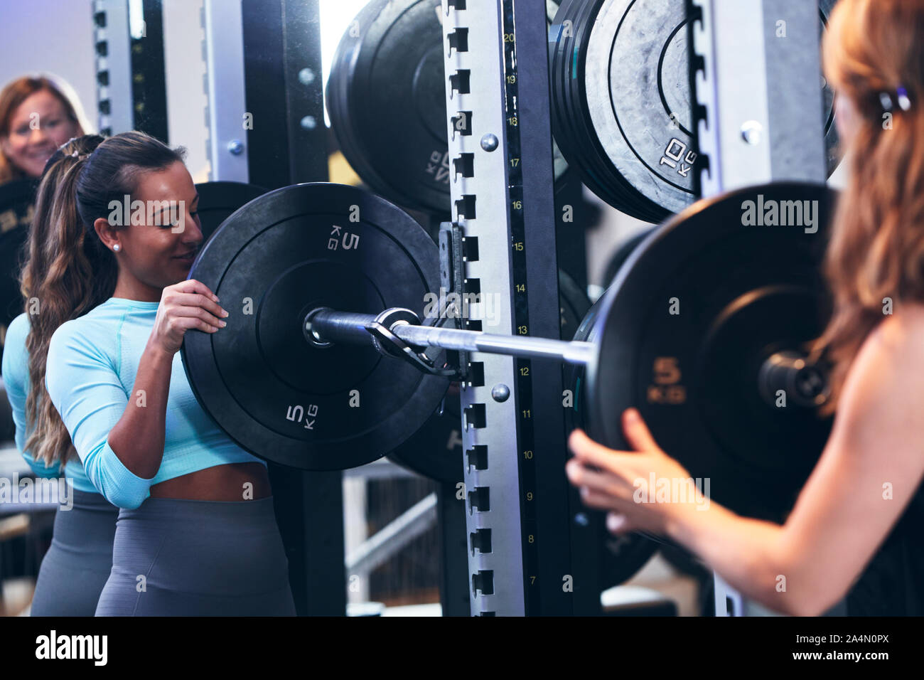 Women in gym Stock Photo - Alamy