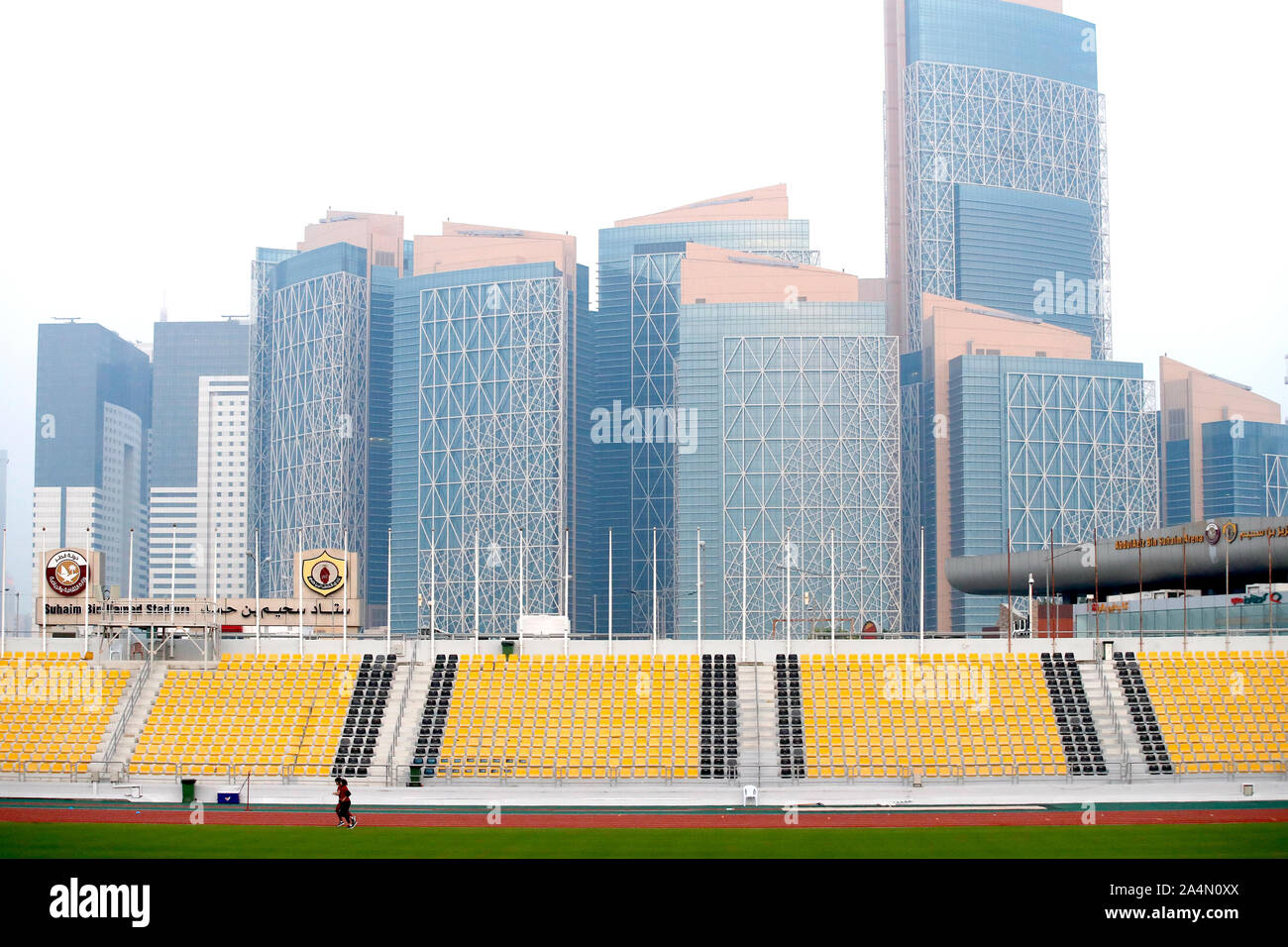 A general view of runners practising laps during the training session ...