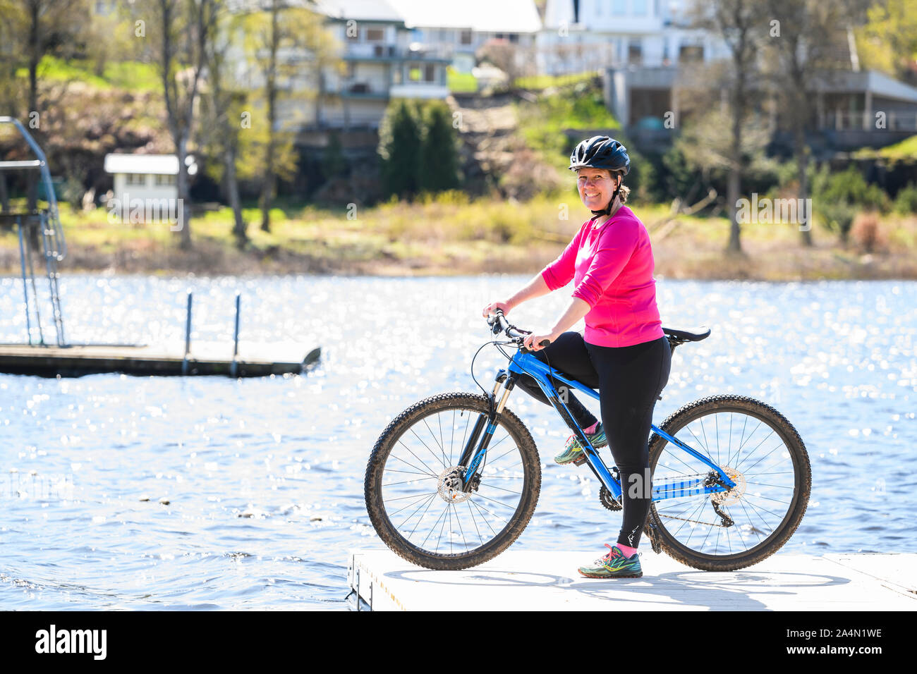 Cyclist standing side on hi-res stock photography and images - Alamy
