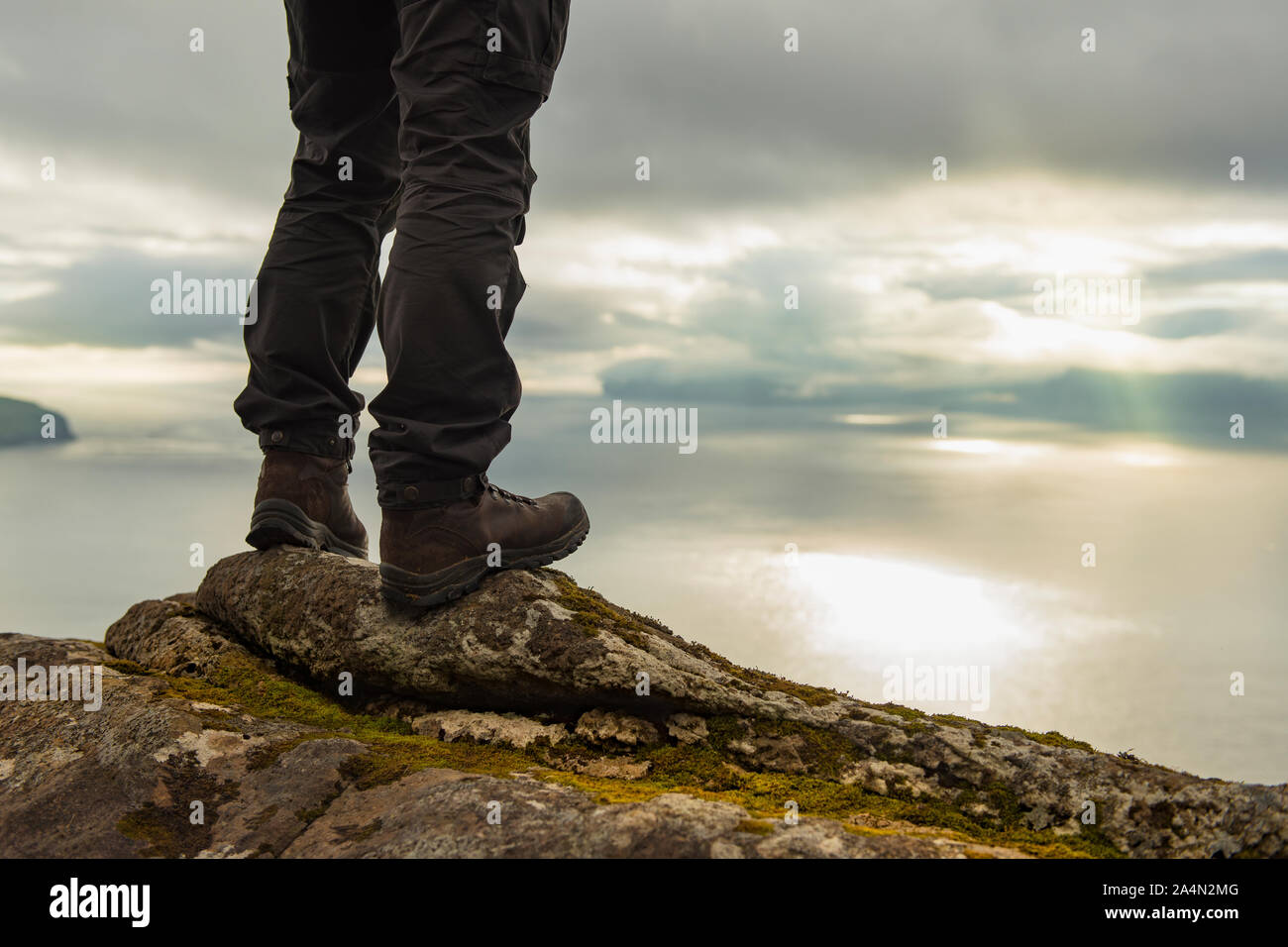 Woman standing height rocks hi-res stock photography and images - Alamy