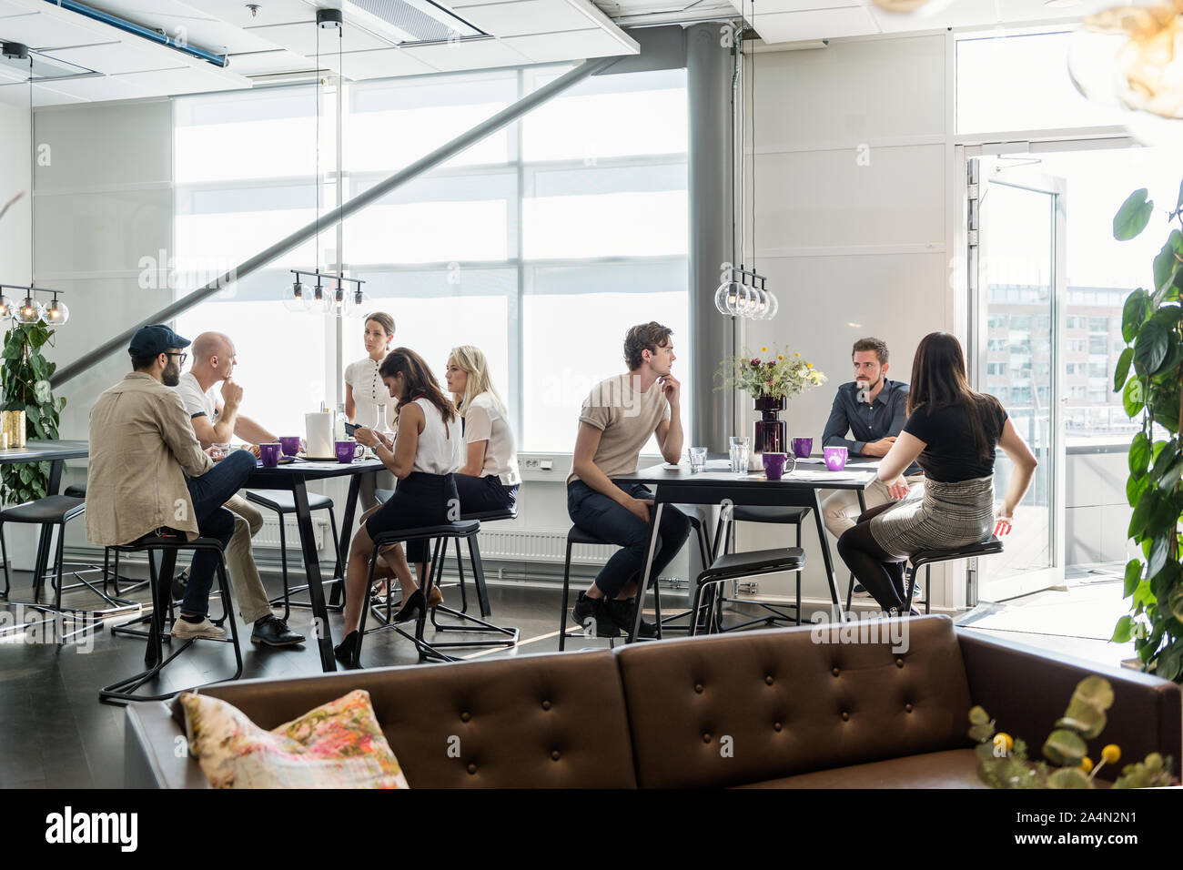 People in office cafeteria Stock Photo - Alamy