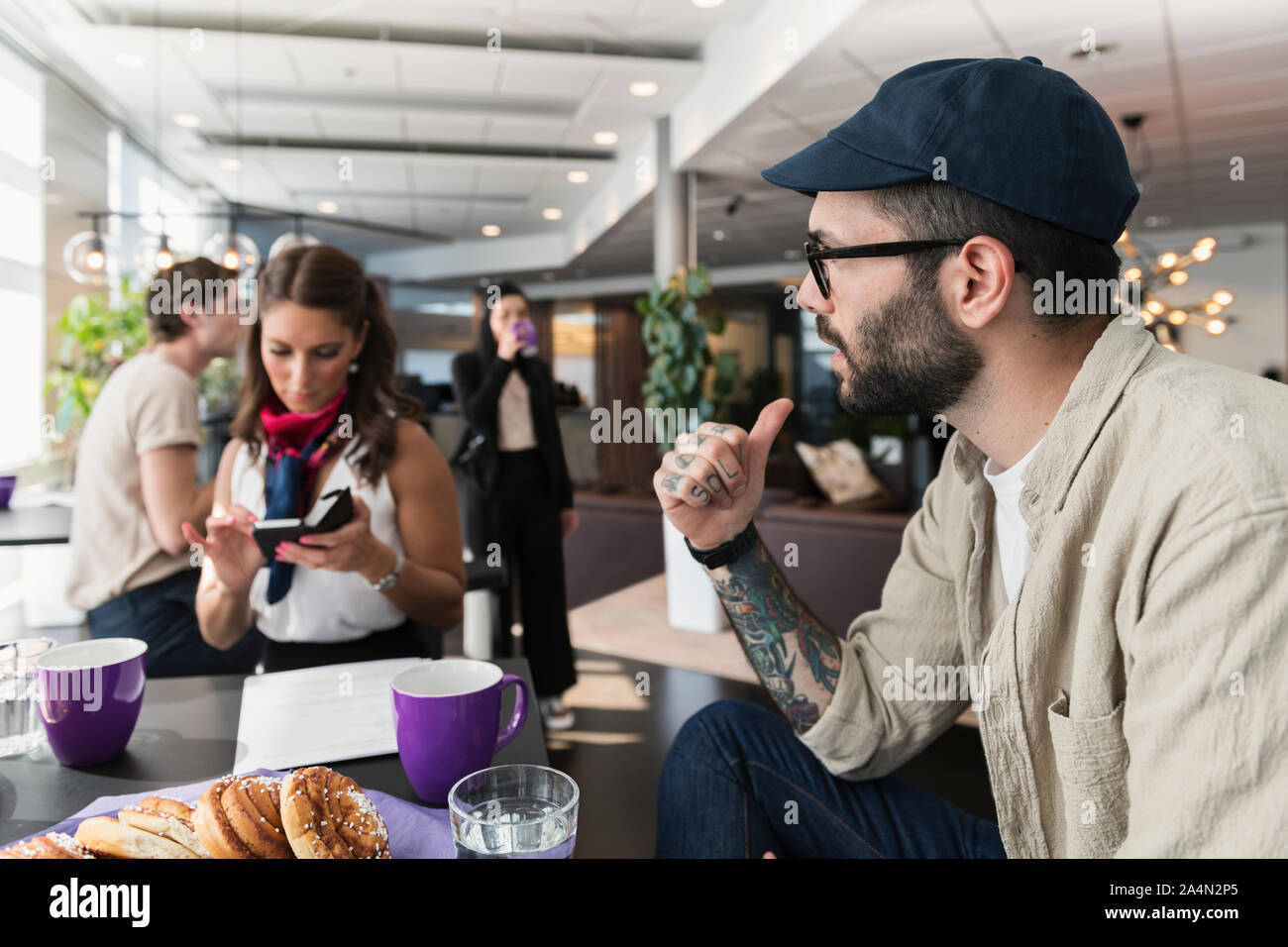 People in office cafeteria Stock Photo - Alamy