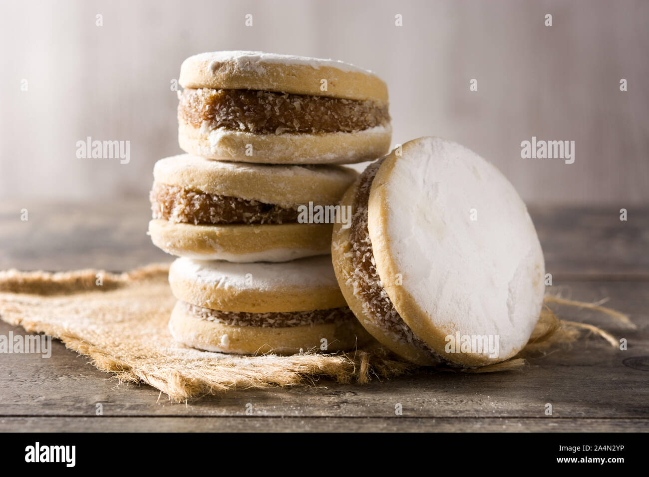 Traditional Argentinian alfajores with dulce de leche and sugar on ...