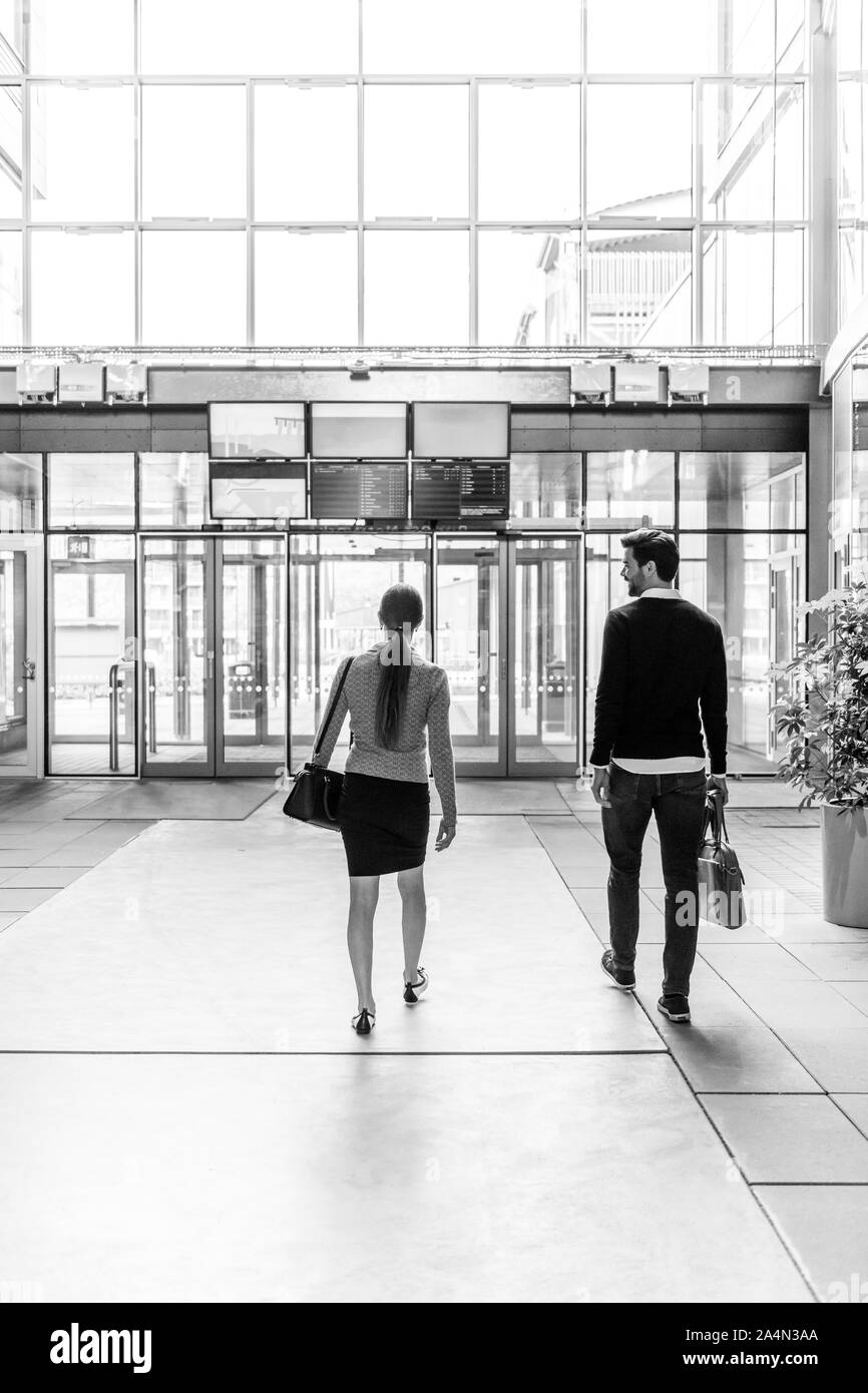 Leaving office building Black and White Stock Photos & Images - Alamy