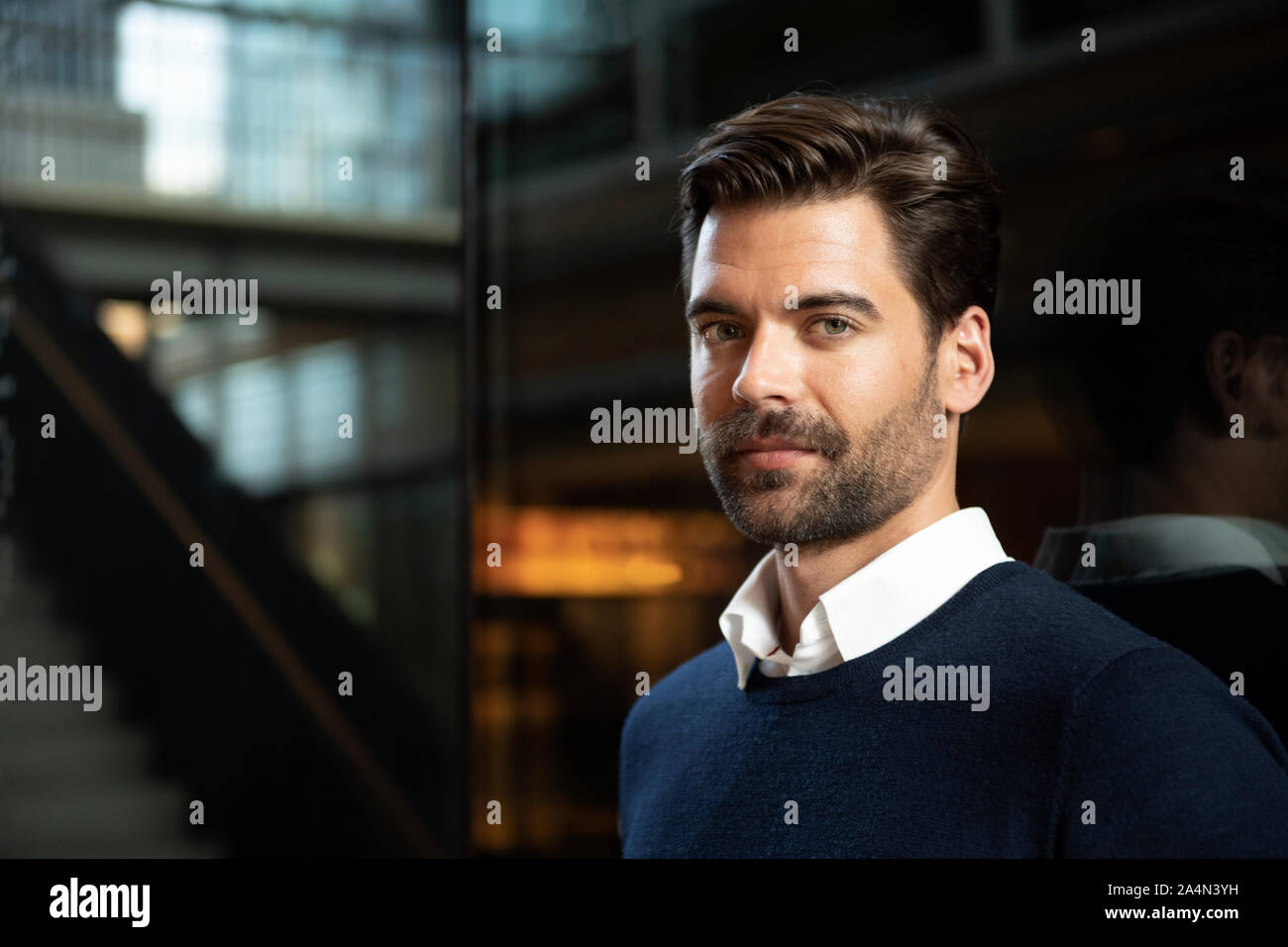 Man looking at camera Stock Photo - Alamy
