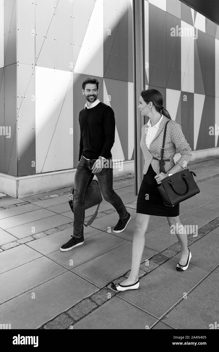 Young businessman working together Black and White Stock Photos ...