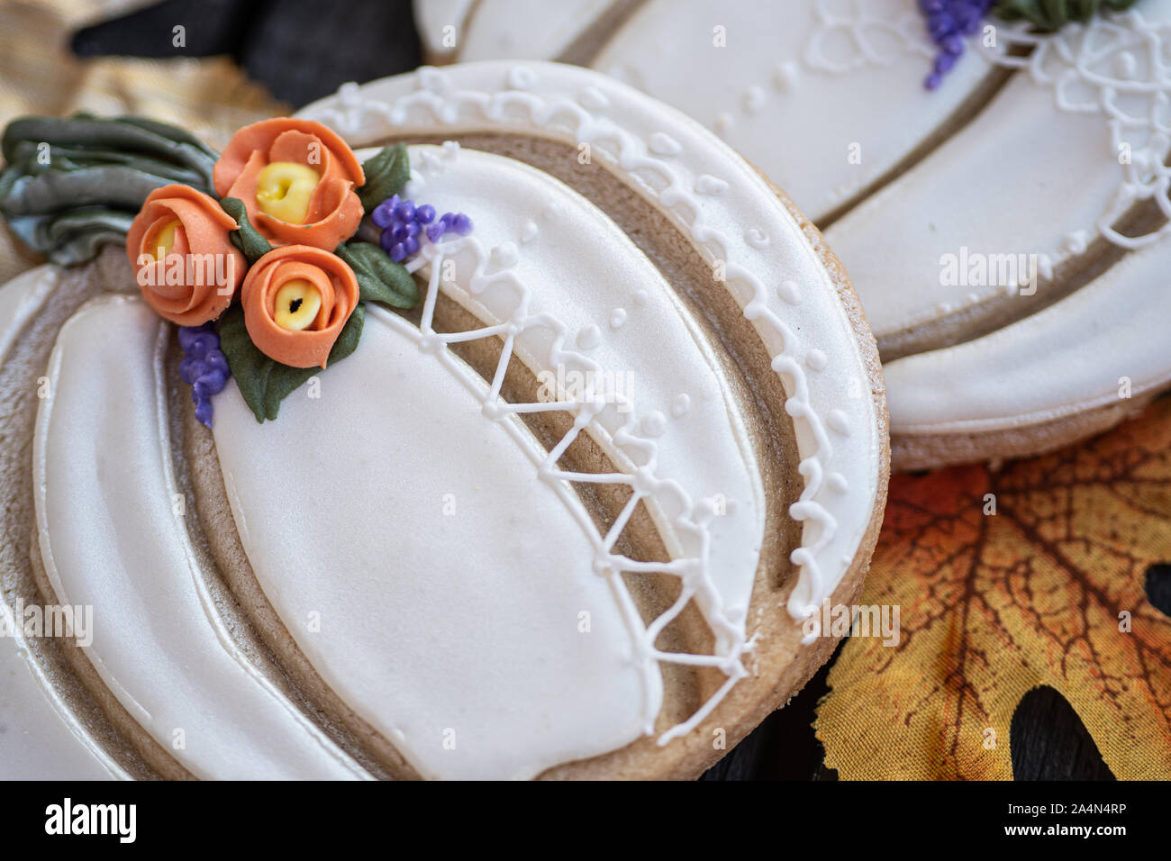 Fall pumpkin cookies decorated with royal icing Stock Photo - Alamy