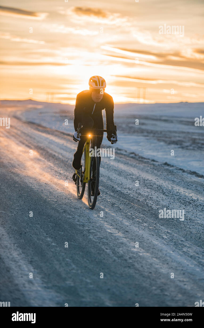 Man looking back cycling hi-res stock photography and images - Alamy