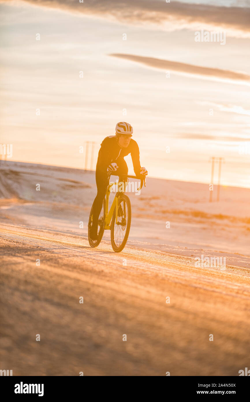 Man looking back cycling hi-res stock photography and images - Alamy
