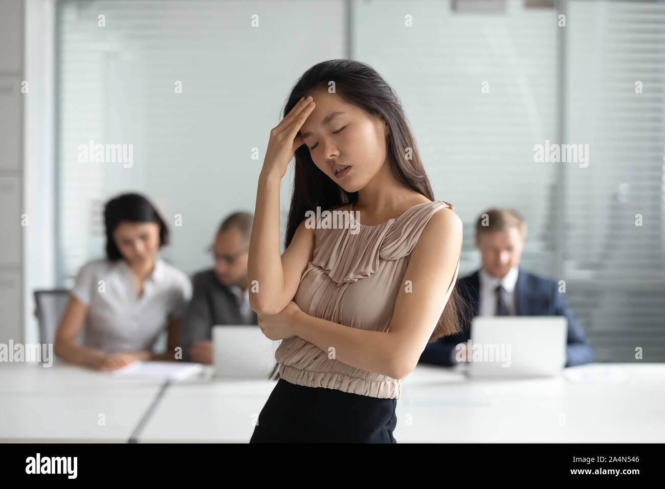 Person touching forehead hi-res stock photography and images - Alamy
