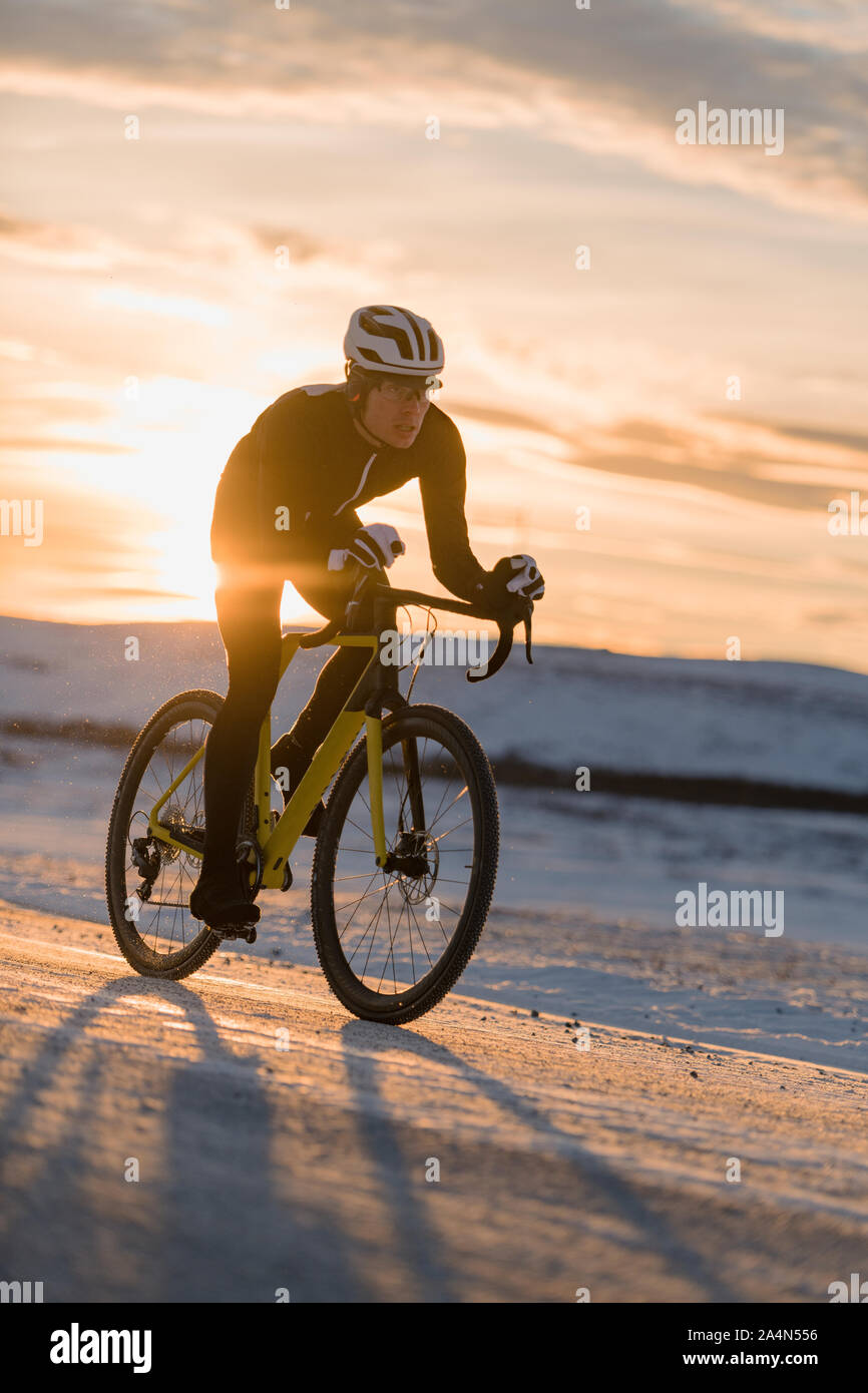 Man looking back cycling hi-res stock photography and images - Alamy