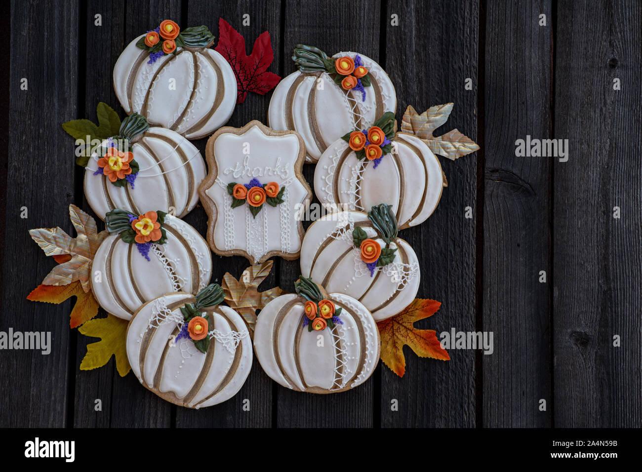 Fall pumpkin cookies decorated with royal icing Stock Photo - Alamy