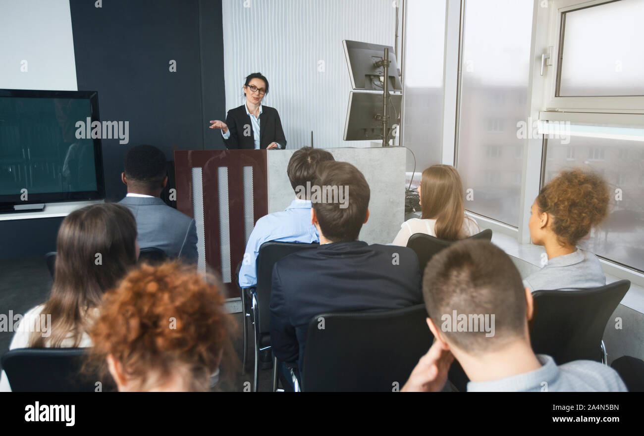 Top manager reading lecture to colleagues at presentation Stock Photo ...