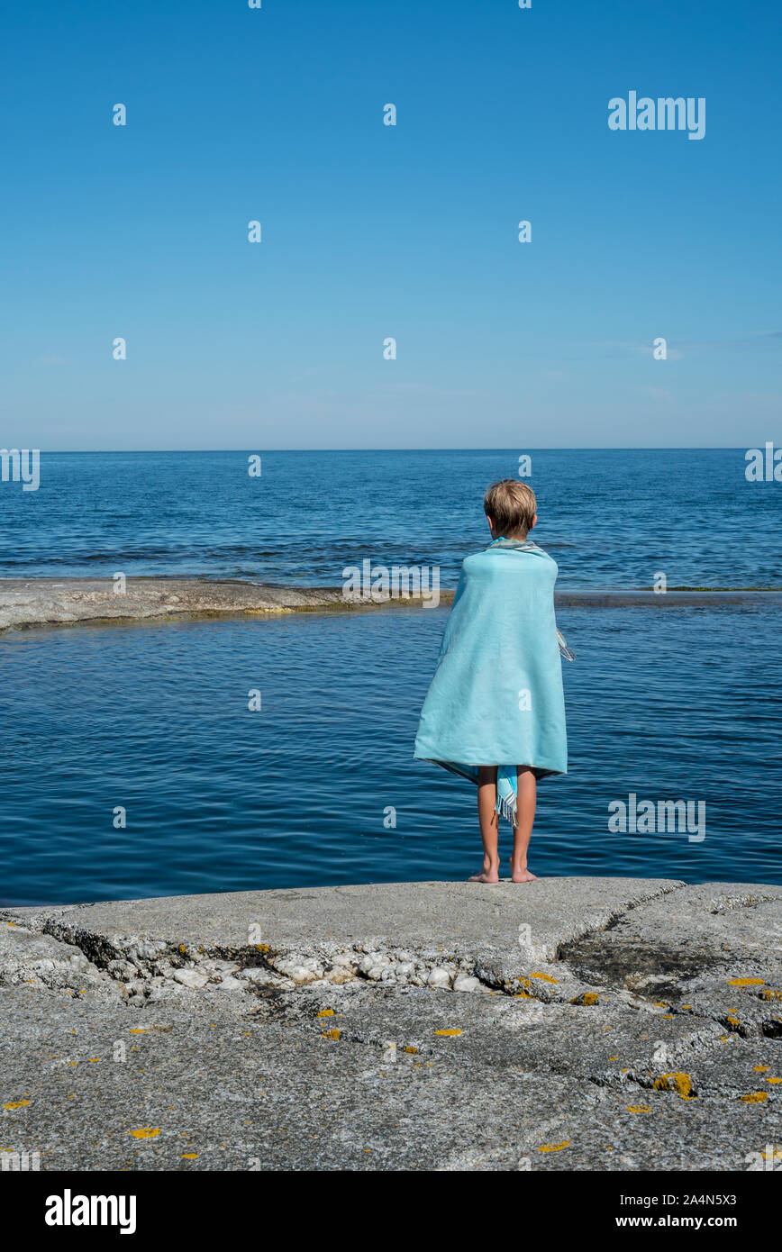 Boy at sea Stock Photo - Alamy