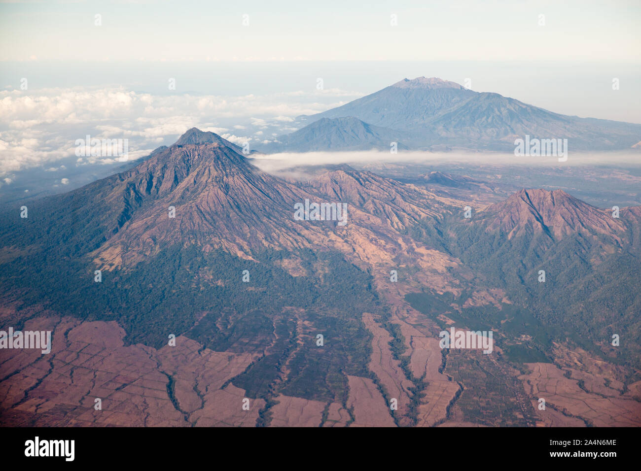 Mountain peaks of Indonesia, the view from the plane. Volcanoes of ...