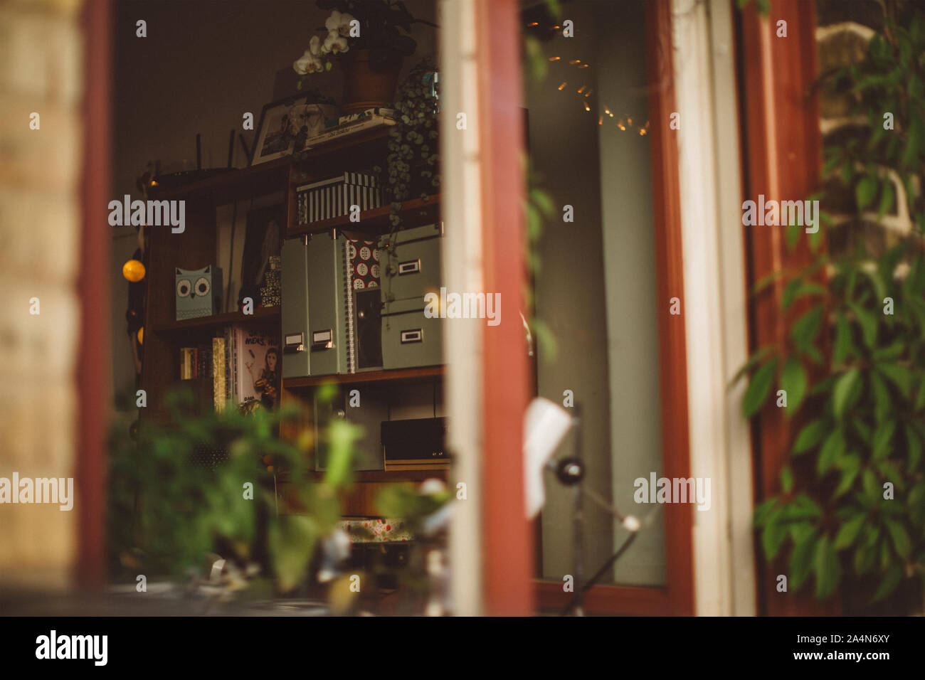 Room seen through window Stock Photo - Alamy