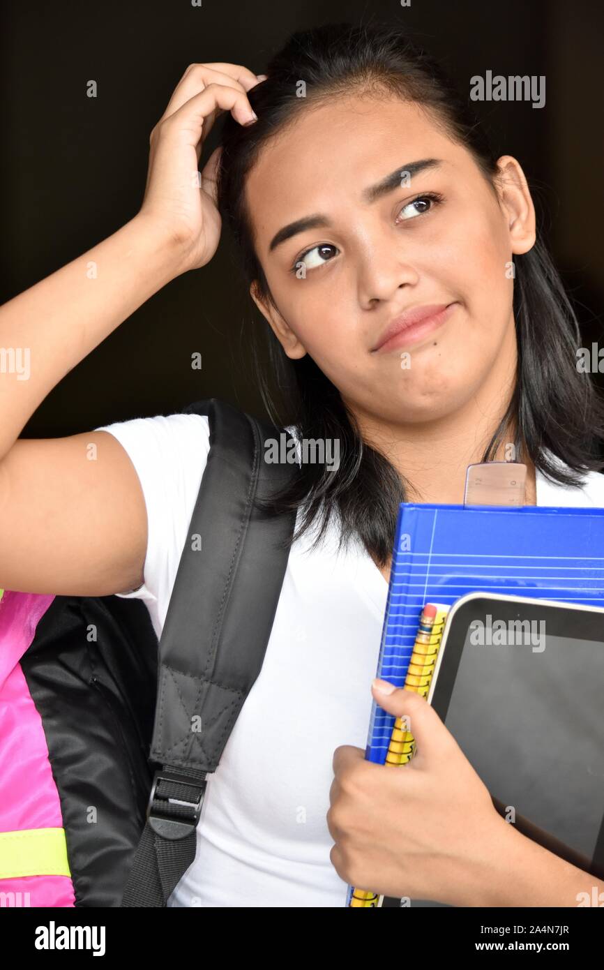 Cute Minority Female Student And Confusion Stock Photo - Alamy