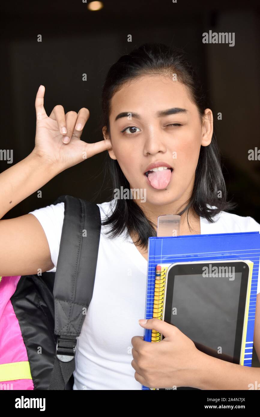 Goofy Cute Minority Student Teenager School Girl With Books Stock Photo ...