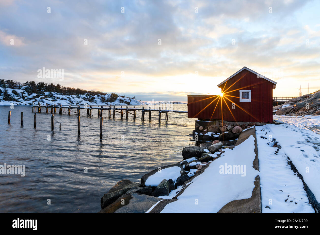 Red cottage by sea Stock Photo - Alamy