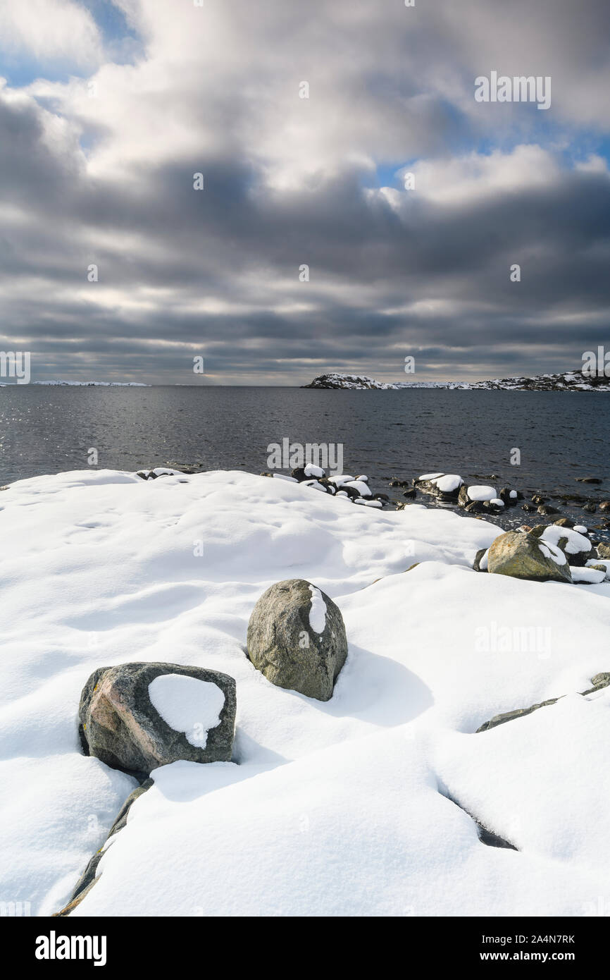 Snow covering coast Stock Photo - Alamy