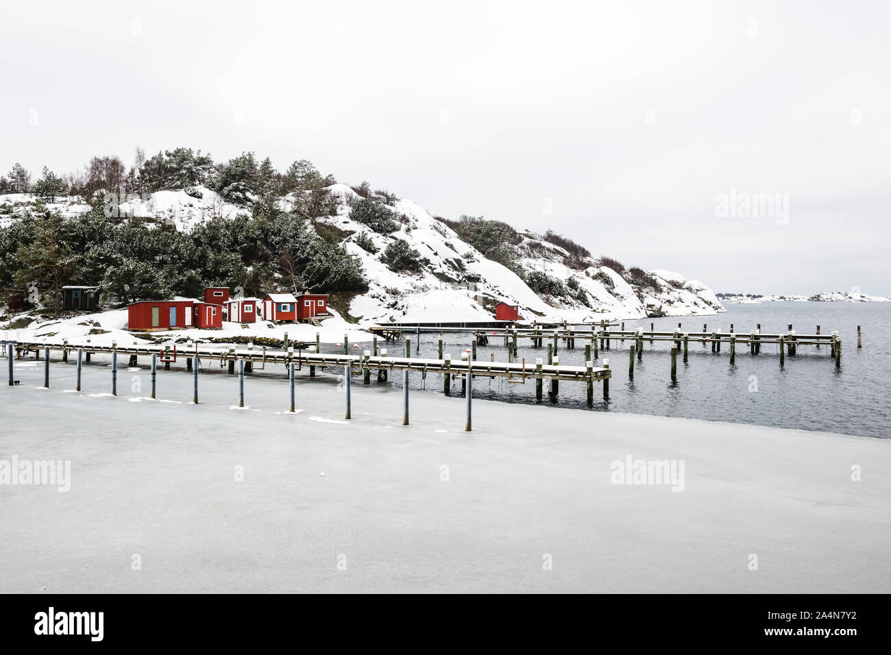 Red cottages by sea Stock Photo - Alamy