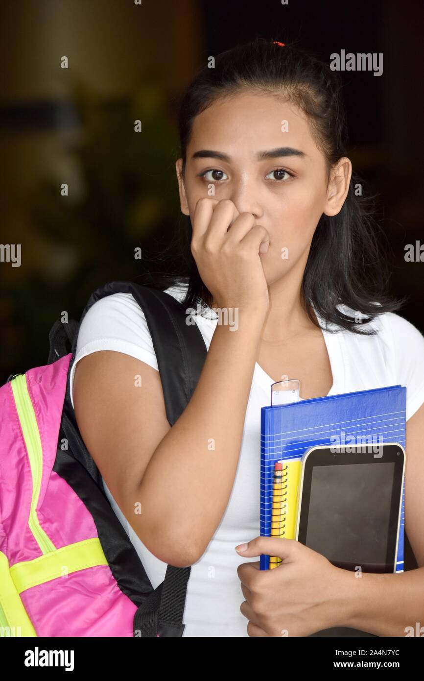 Female Student And Fear With Notebooks Stock Photo - Alamy