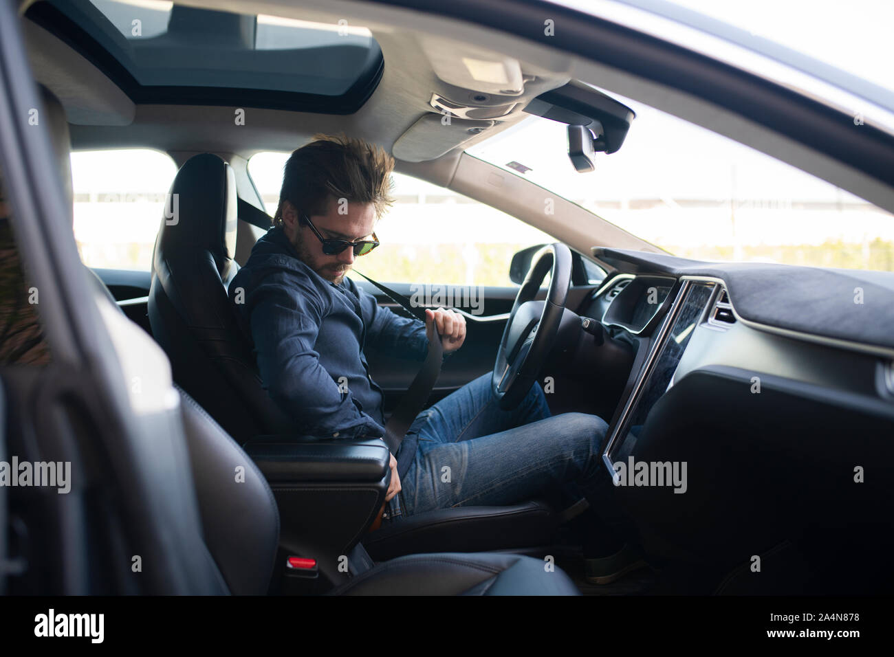 Driver in car Stock Photo - Alamy
