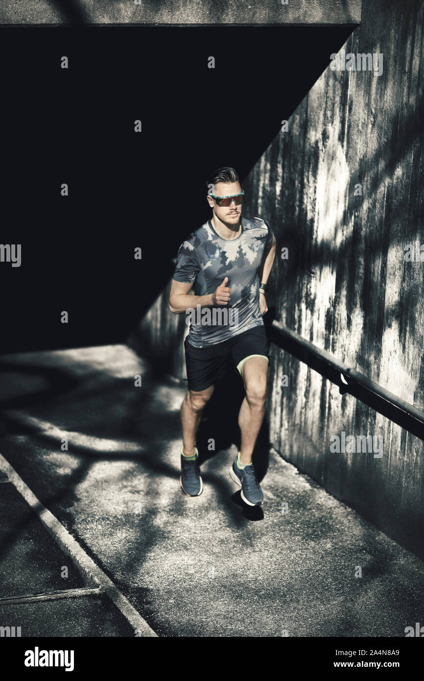 Man shadow running away hi-res stock photography and images - Alamy