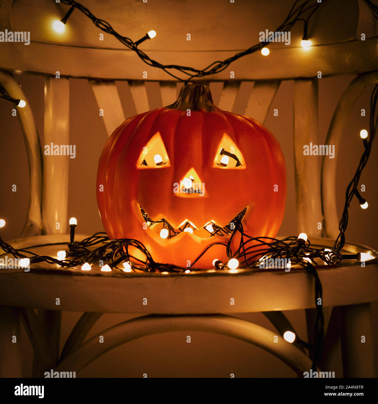 Halloween pumpkin head in mystic atmosphere with lights Stock Photo - Alamy