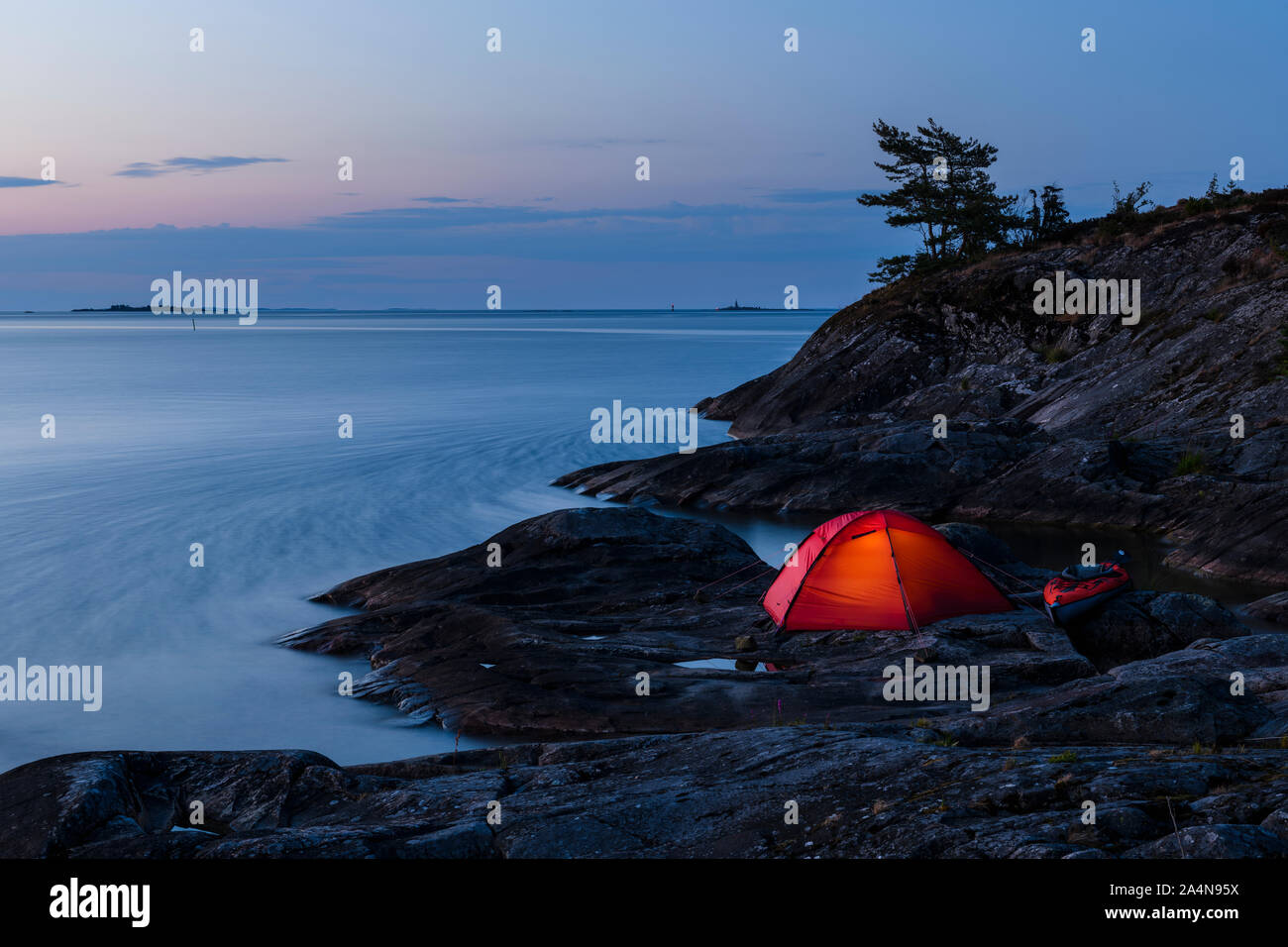Tent on rocks Stock Photo - Alamy