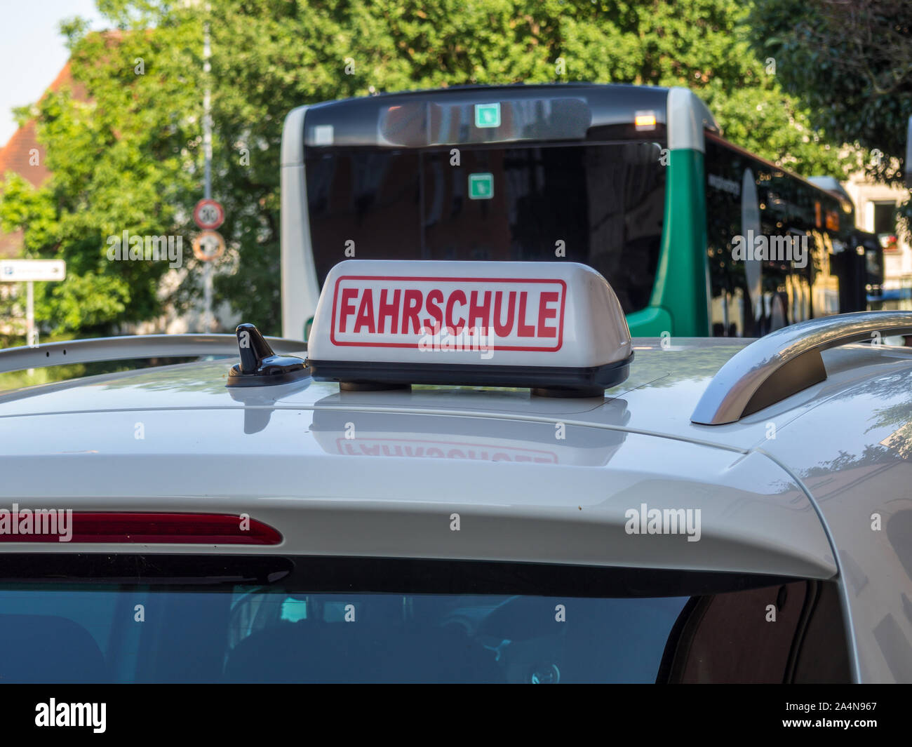 German Driving school sign with bus Stock Photo - Alamy