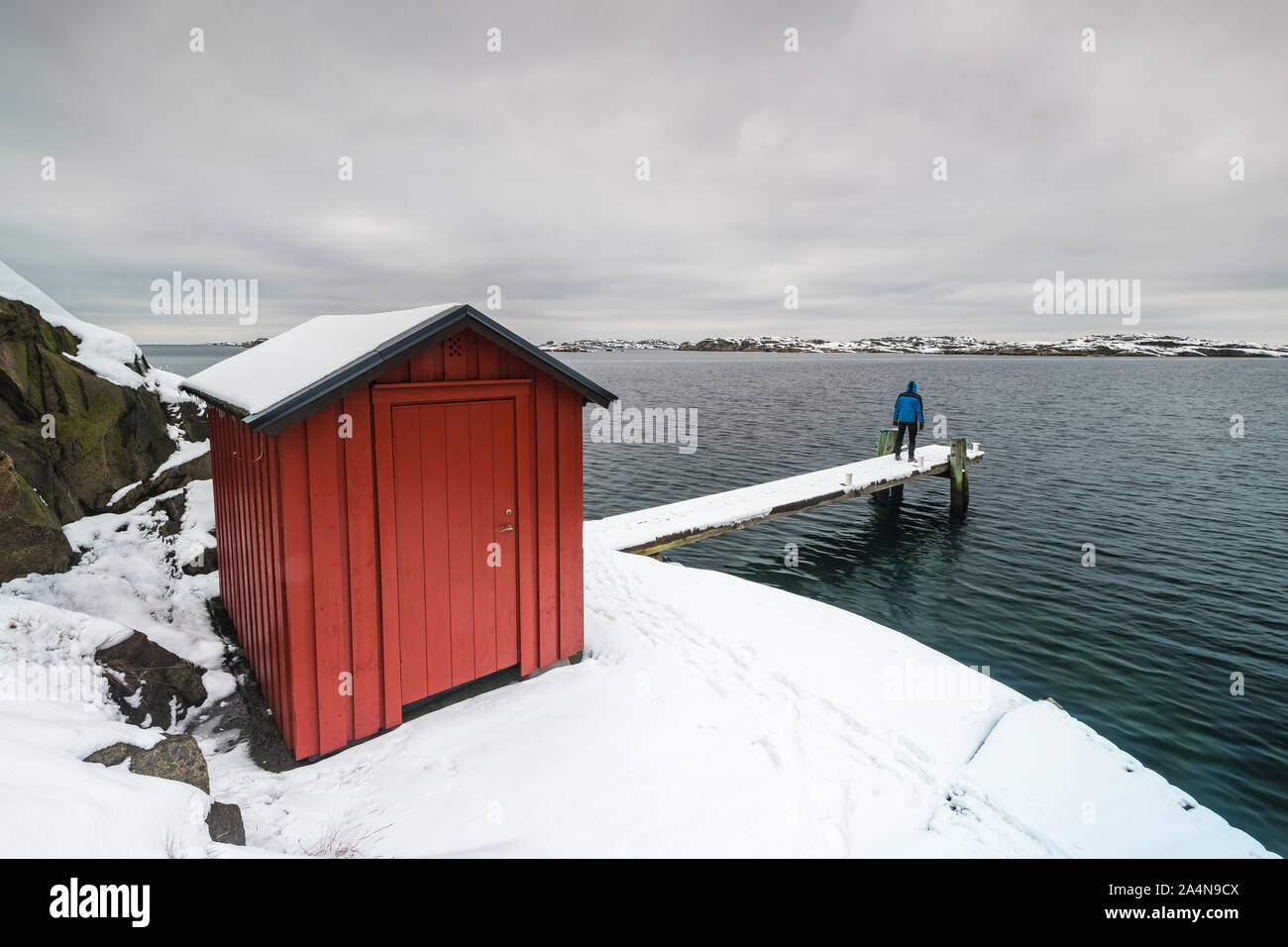 Red cottage by sea Stock Photo - Alamy