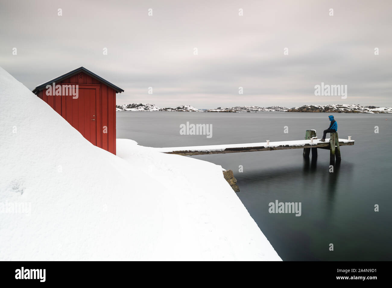 Red cottage by sea Stock Photo - Alamy