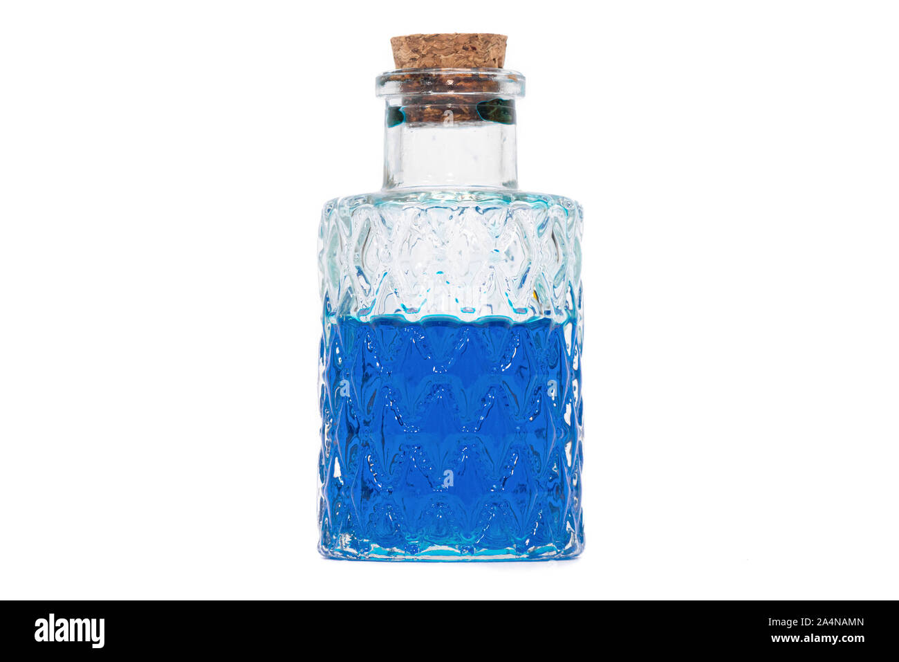 Blue liquid in a bottle isolated on white background Stock Photo - Alamy