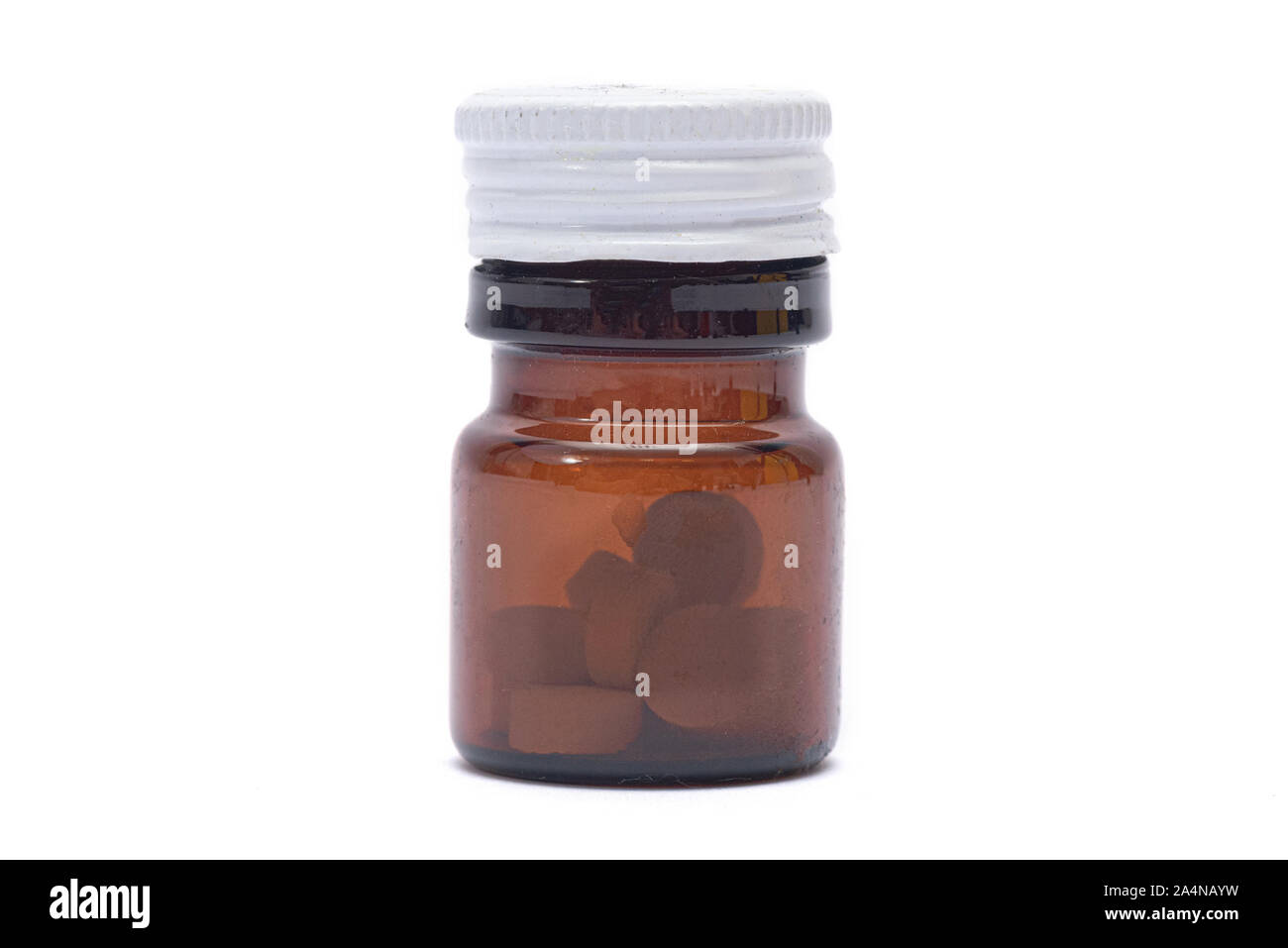 Brown jar with white cover with tablets within isolated on white ...
