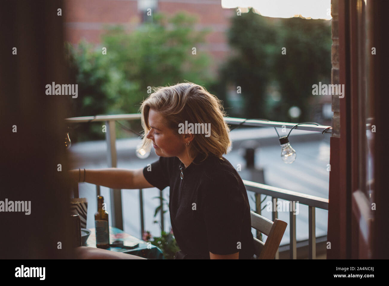 Person at the balcony hi-res stock photography and images - Alamy