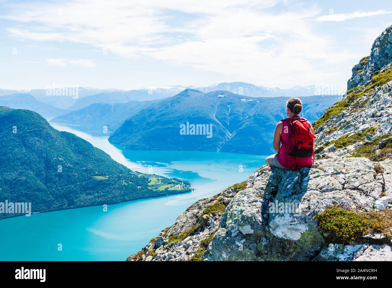 Woman looking at lake Stock Photo - Alamy