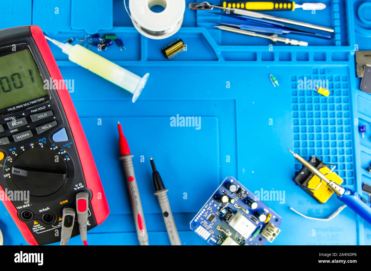 The electrician's workplace. Electronics. Schemes soldering iron ...