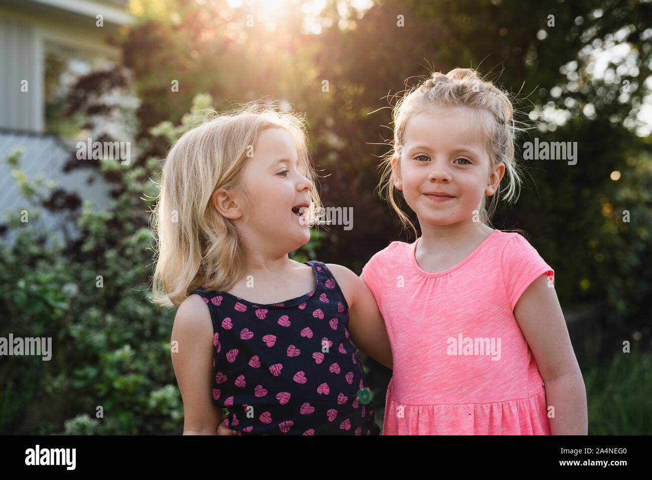 Two small girls Stock Photo - Alamy