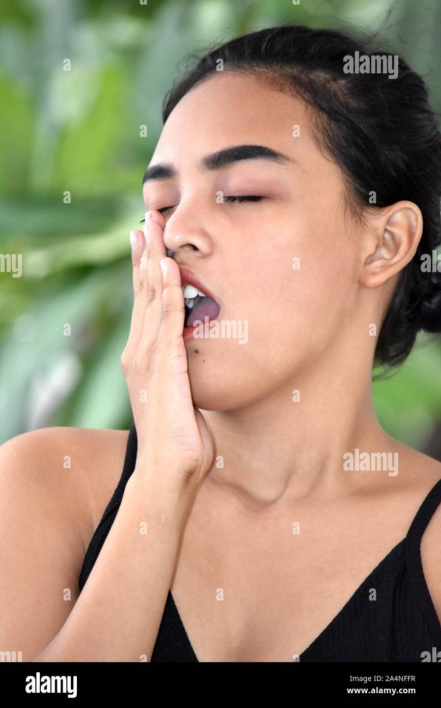 Tired Pretty Minority Person Stock Photo - Alamy
