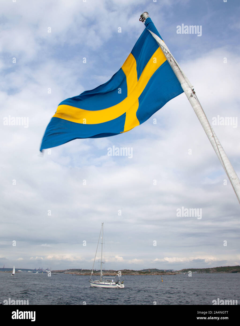 The archipelago of Gothenburg. Swedish flag on a boat.Photo Jeppe ...