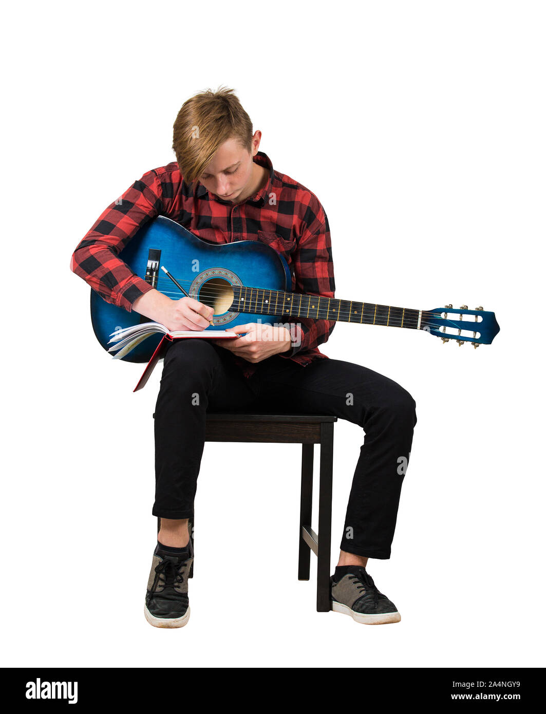 Full length portrait of talented boy music composer with his trendy ...