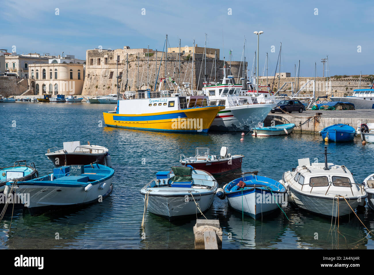 Boats tied up in Gallipoli harbour with Angevine-Aragonese Castle in ...