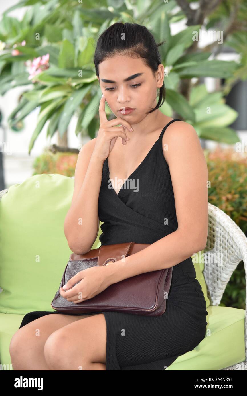 Kid sitting thinking hi-res stock photography and images - Alamy