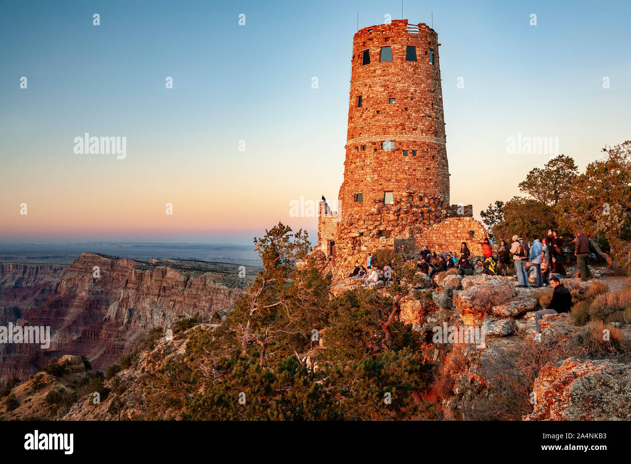 People at Desert View Watch Tower and canyon walls, Grand Canyon ...