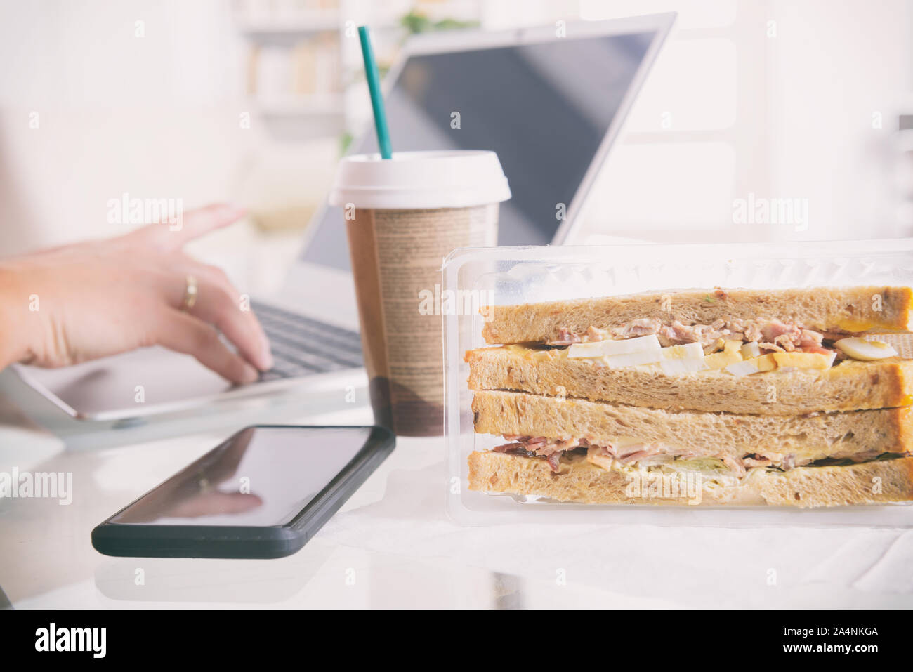 Woman desk snack unhealthy hi-res stock photography and images - Alamy