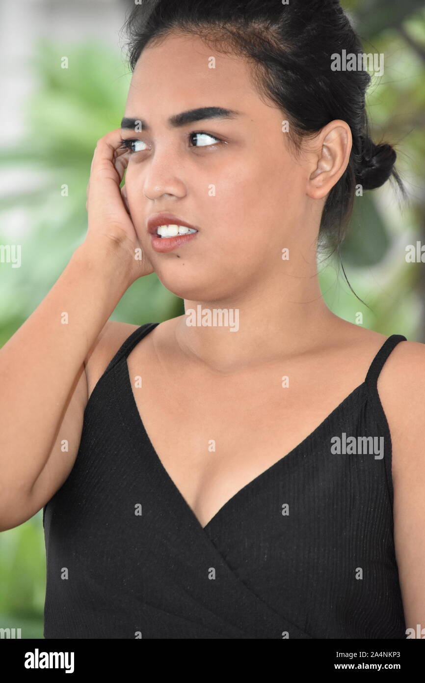 Youthful Girl And Confusion Stock Photo - Alamy